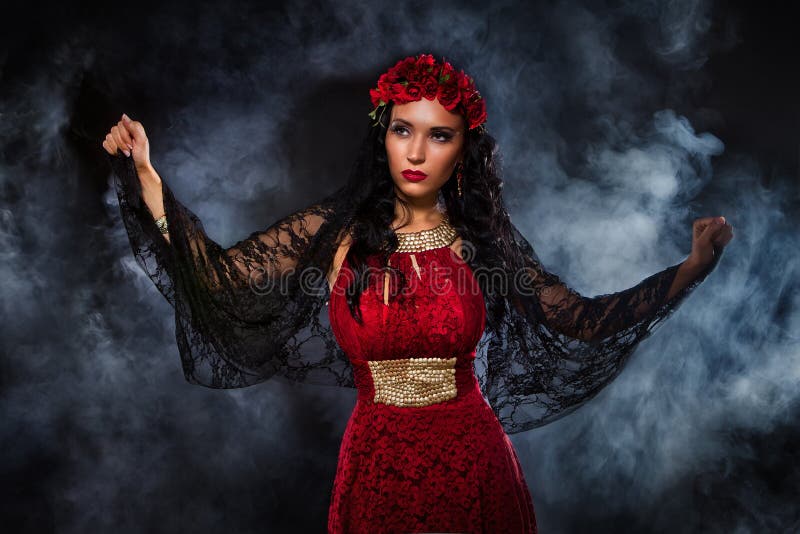 Witch in red dress stock image. Image of lace, horror - 125172971