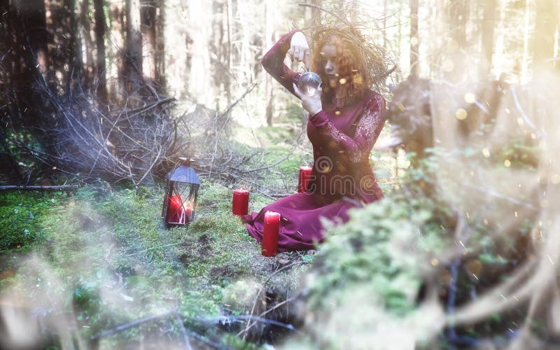 Witch ritual in a forest stock photo. Image of conjure - 112566552