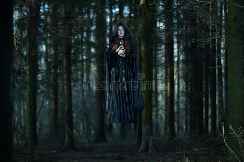 Witch with a Skull Levitating Stock Image - Image of fantasy ...