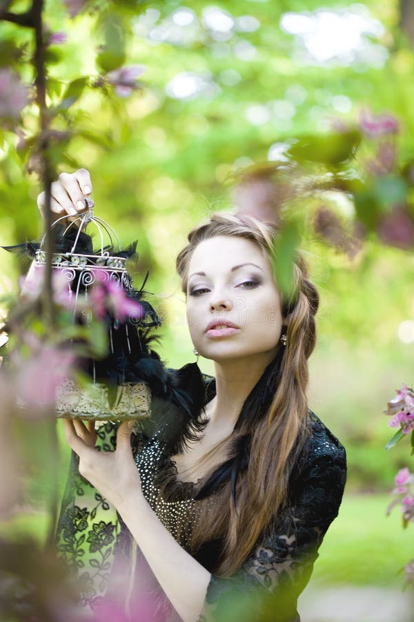 Witch with a strange cage stock photo. Image of danger - 25943052
