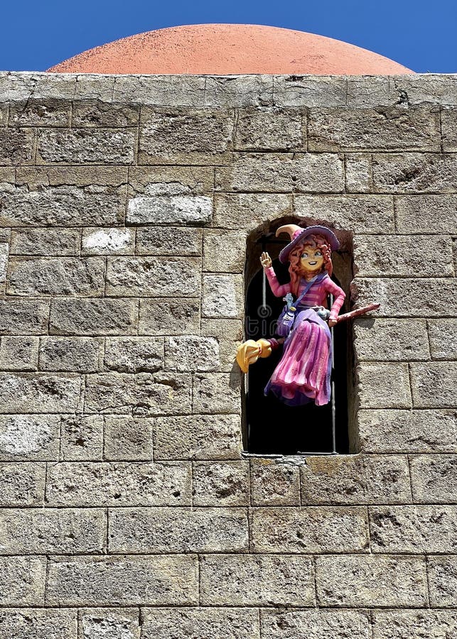Witch in the Window in the Historic Centre of Rhodes Town. Editorial ...