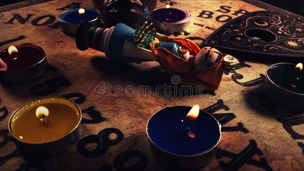 Witchcraft Ouija Board and Voodoo Magic Doll Stock Photo - Image of ...