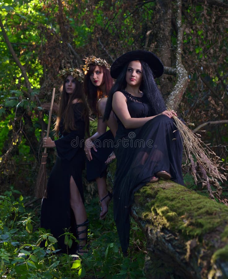 Witches in dark forest stock photo. Image of long, hair - 58642594