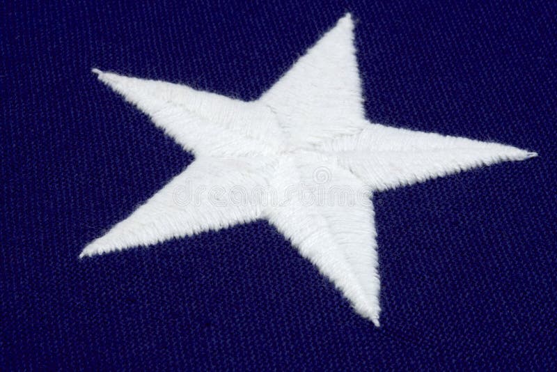 Witte ster op blauw gebied stock foto. Image of macro - 12978270