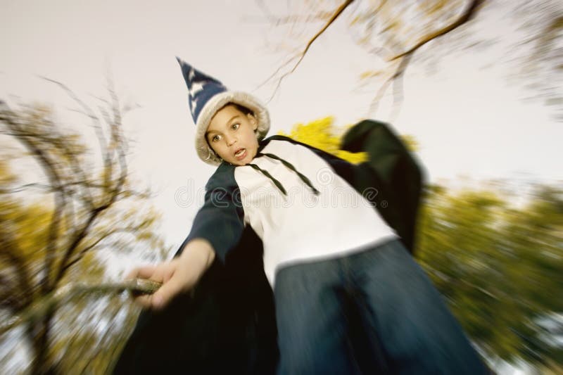 Wizard Boy with a Stick Wand Stock Image - Image of conjurer, wizard ...