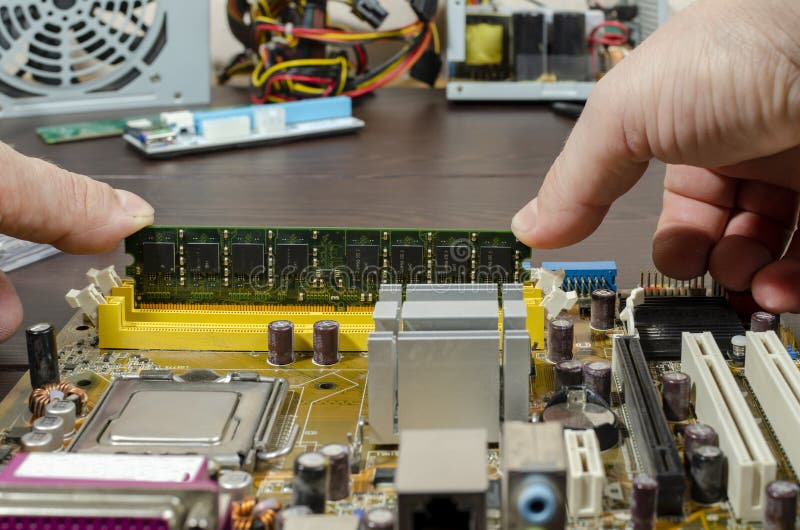 Replacing the Memory Strip on the Motherboard of a Personal Computer ...