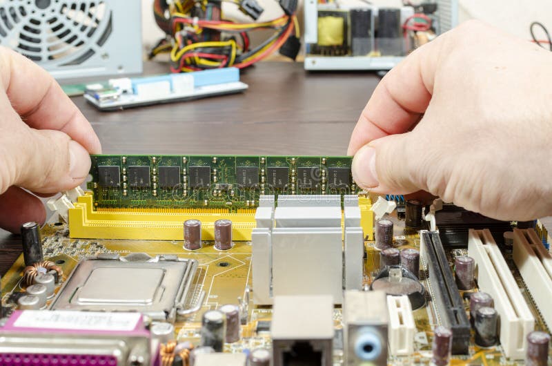 Replacing the Memory Strip on the Motherboard of a Personal Computer ...