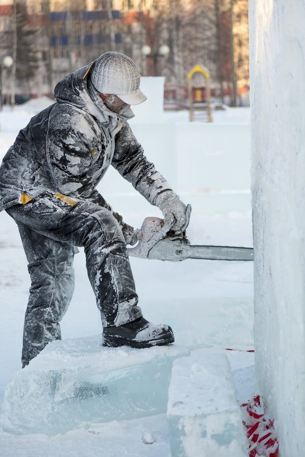 The Wizard Cuts Figures from the Ice Chainsaw Stock Image - Image of ...