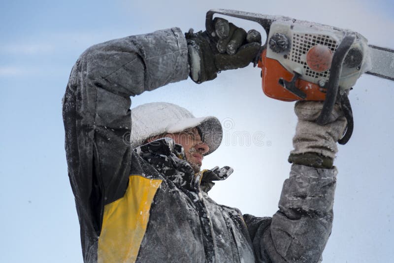 The Wizard Cuts Figures from the Ice Chainsaw Stock Photo - Image of ...