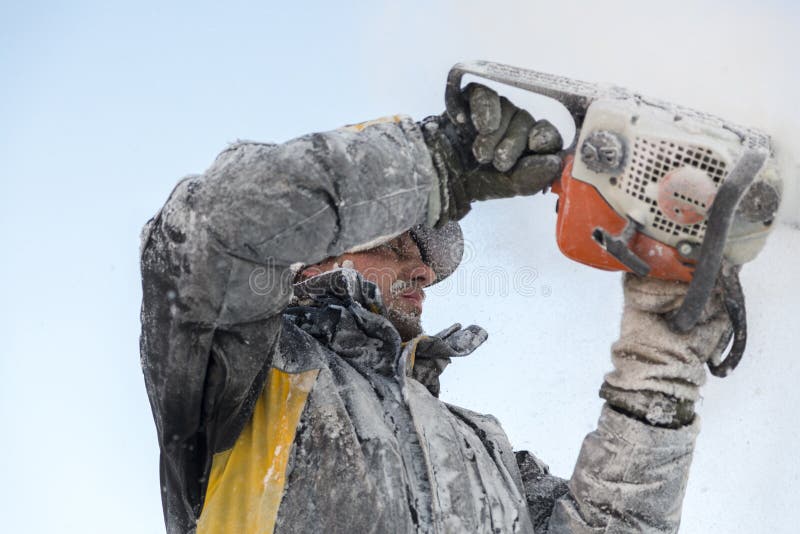 The Wizard Cuts Figures from the Ice Chainsaw Stock Photo - Image of ...