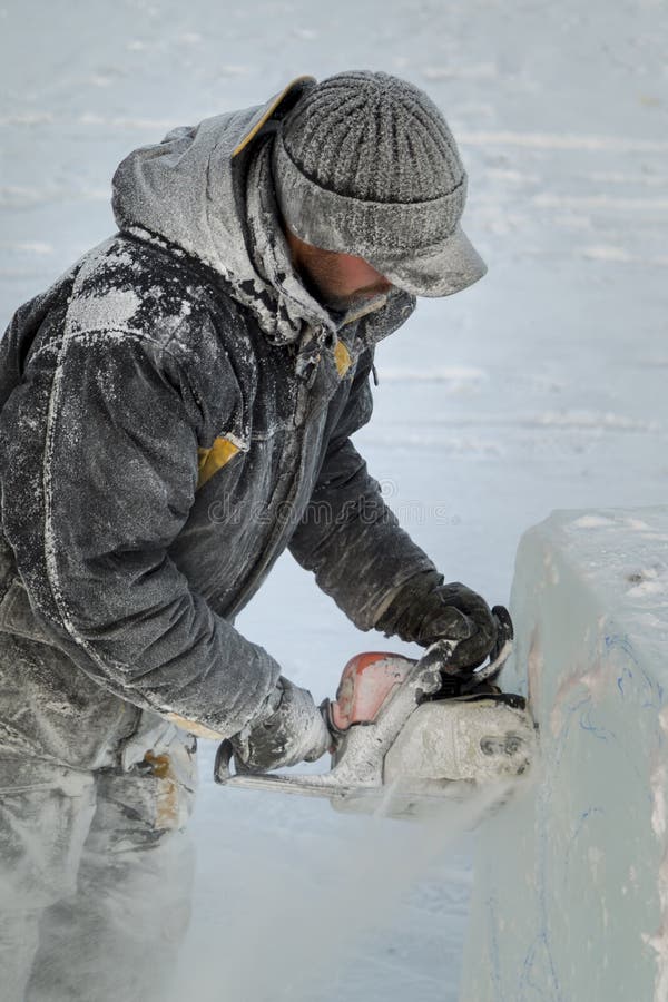 The Wizard Cuts Figures from the Ice Chainsaw Stock Photo - Image of ...