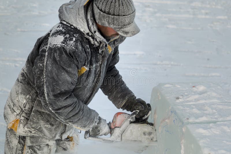 The Wizard Cuts Figures from the Ice Chainsaw Stock Photo - Image of ...