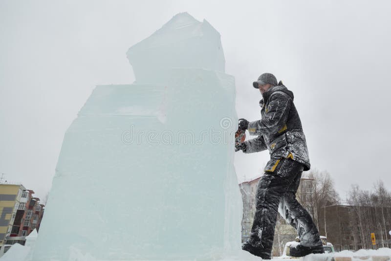 The Wizard Cuts Figures from the Ice Chainsaw Stock Image - Image of ...