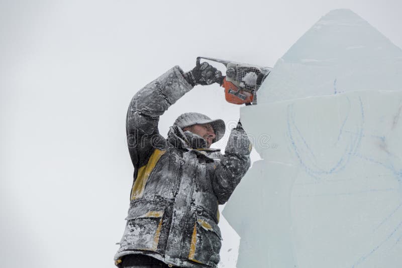 The Wizard Cuts Figures from the Ice Chainsaw Stock Photo - Image of ...