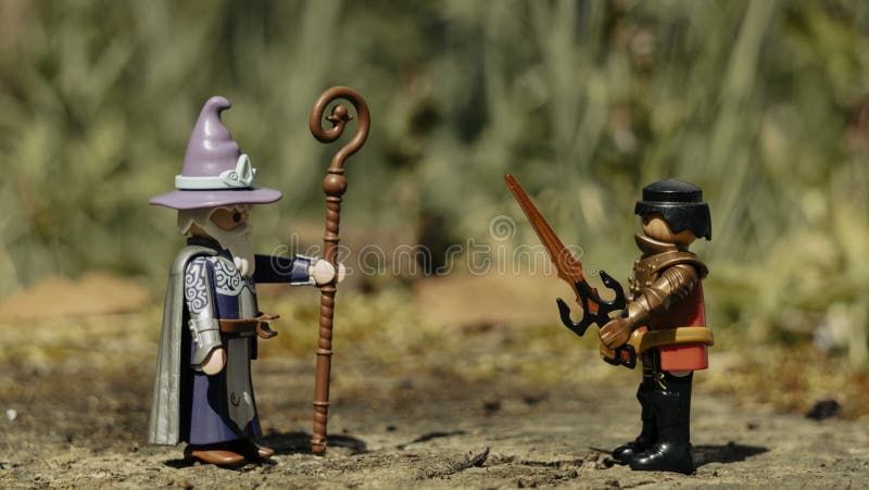 A Wizard Facing a Knight Armed with a Sword, Prepares for Battle ...