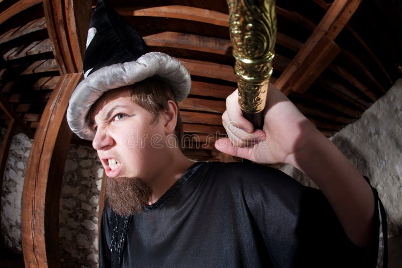 Wizard Holding Staff Over Shoulder Stock Image - Image of outraged ...