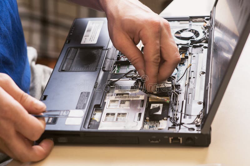 Wizard Repairs Laptop with Tools and Hands Stock Photo - Image of ...