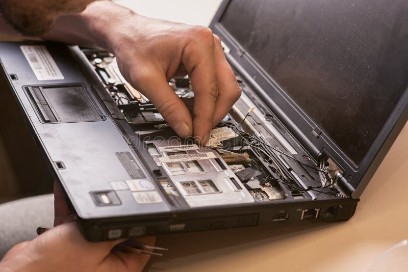 Wizard Repairs Laptop with Tools and Hands Stock Image - Image of ...