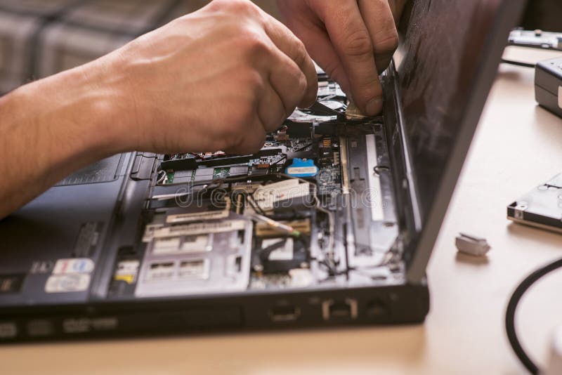 Wizard Repairs Laptop with Tools and Hands Stock Photo - Image of ...