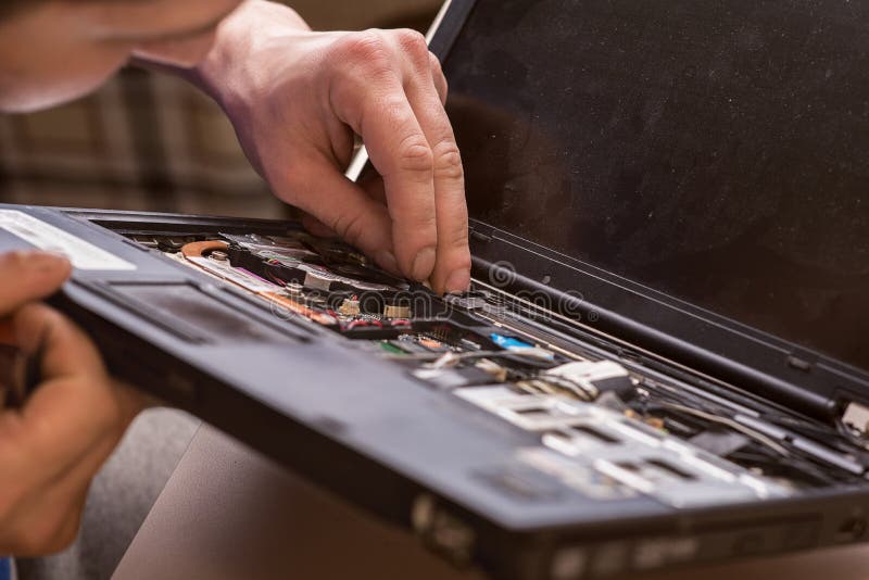Wizard Repairs Laptop with Tools and Hands Stock Photo - Image of ...