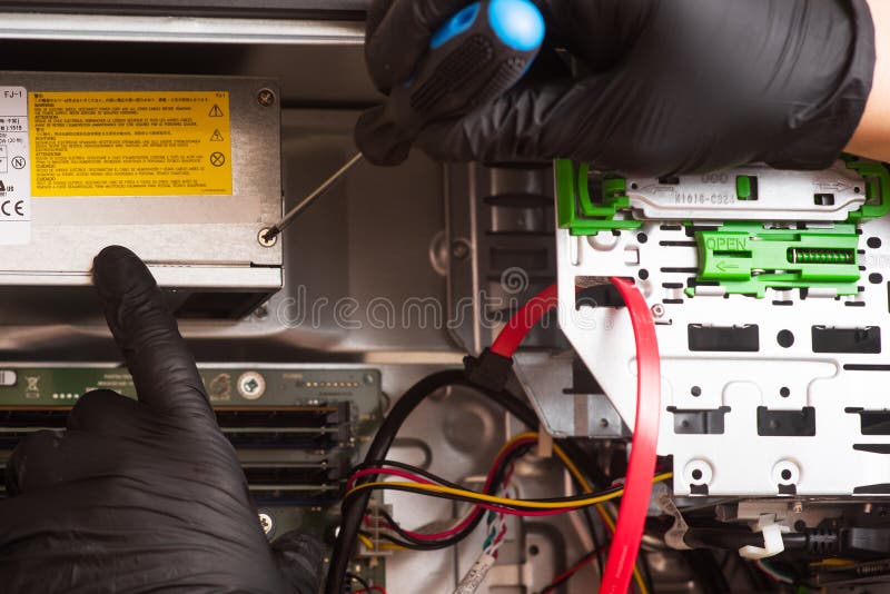 Wizard Repairs Personal Computer with Tools and Hands. Disassembly of ...