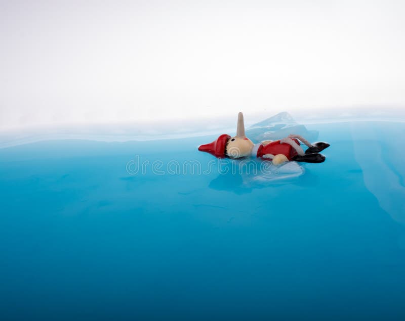 Wodden Puppet Pinocchio in Water Stock Image - Image of water, figure ...