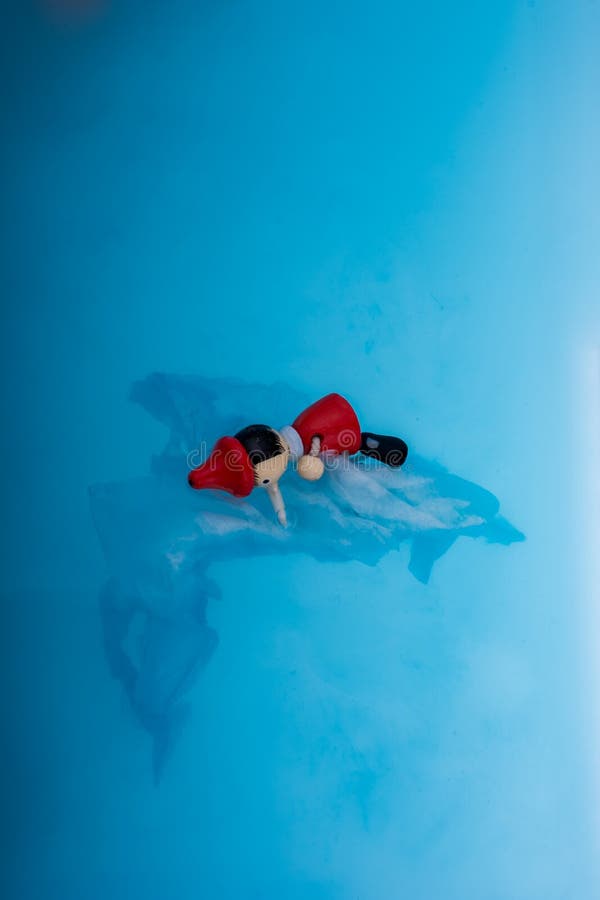 Wodden Puppet Pinocchio in Water Stock Image - Image of lying, figure ...