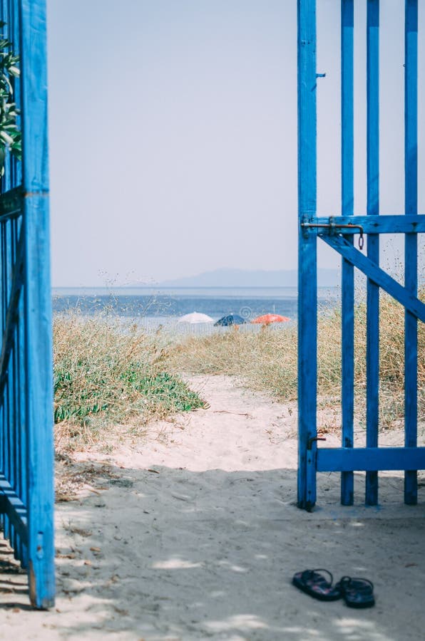 Woden Blue Gate Open Towards the Beach Stock Image - Image of fence ...