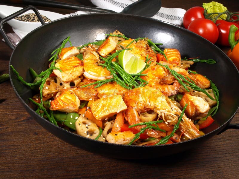 Wok with Salmon and Noodles Stock Photo - Image of drink, cooking ...