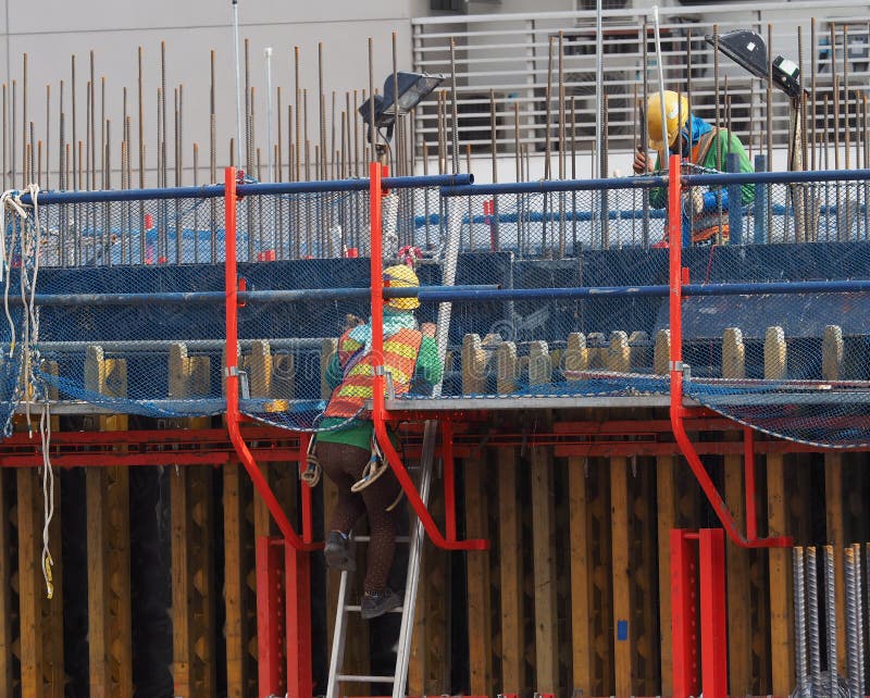 Woker are Woking on Top of Concrete Structure Pole with Seafty Set ...