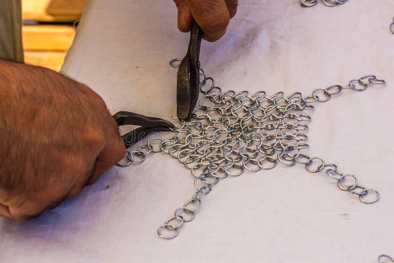 Woking on a chainmail stock photo. Image of medieval - 103566074