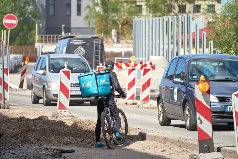 Wolt Food Delivery Man on a Bicycle on a Road Undergoing Reconstruction ...