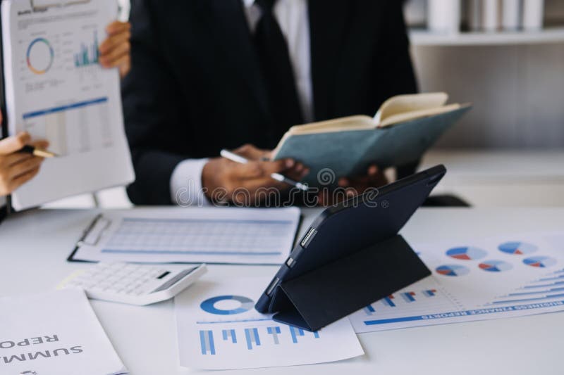 Woman Accountant Use Calculator and Computer with Holding Pen on Stock ...