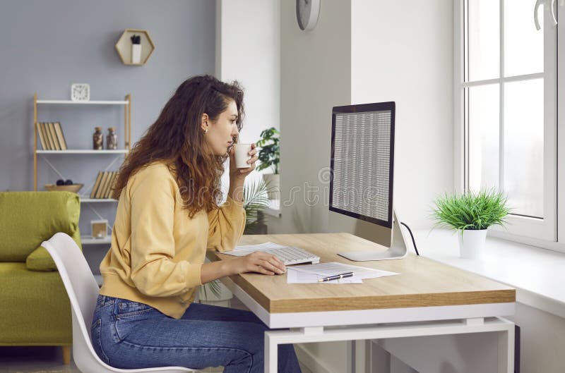 Woman Accountant Working from Home, Using Spreadsheets on Her Computer ...