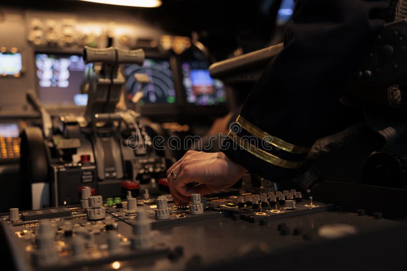 Woman Aircrew Switching Control Panel Buttons on Dashboard Command ...