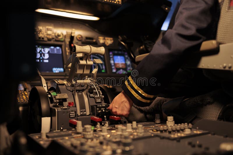 Woman Airliner Pushing Dashboard Buttons in Plane Cockpit Stock Image ...