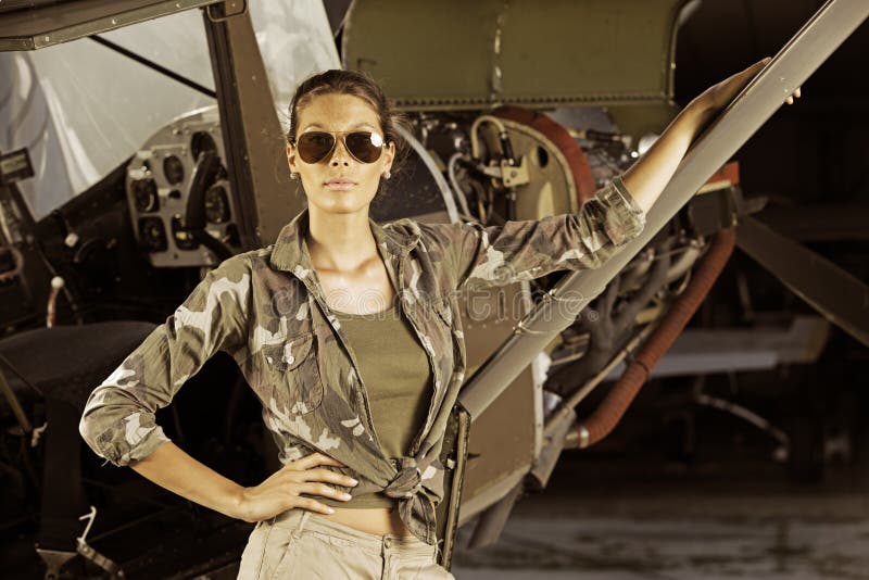 Woman airplane pilot stock photo. Image of model, military - 26663340