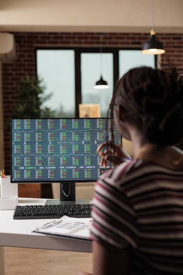 Woman Analyzing Forex Charts, Looking at Exchange Market Data Stock ...
