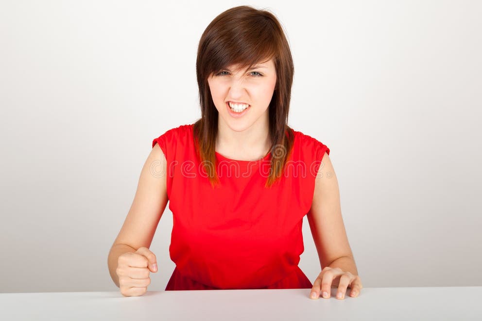 The Woman is Angrily Sitting at the Table Stock Image - Image of ...