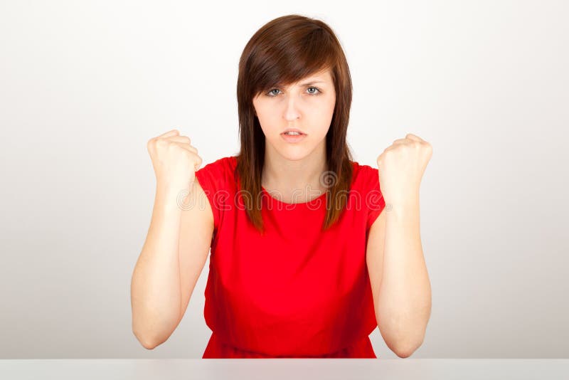 The Woman is Angrily Sitting at the Table Stock Photo - Image of head ...