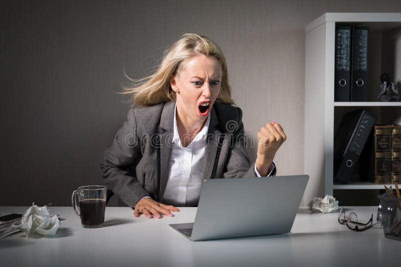 Woman Angry at Her Laptop Computer at Work Stock Image - Image of ...