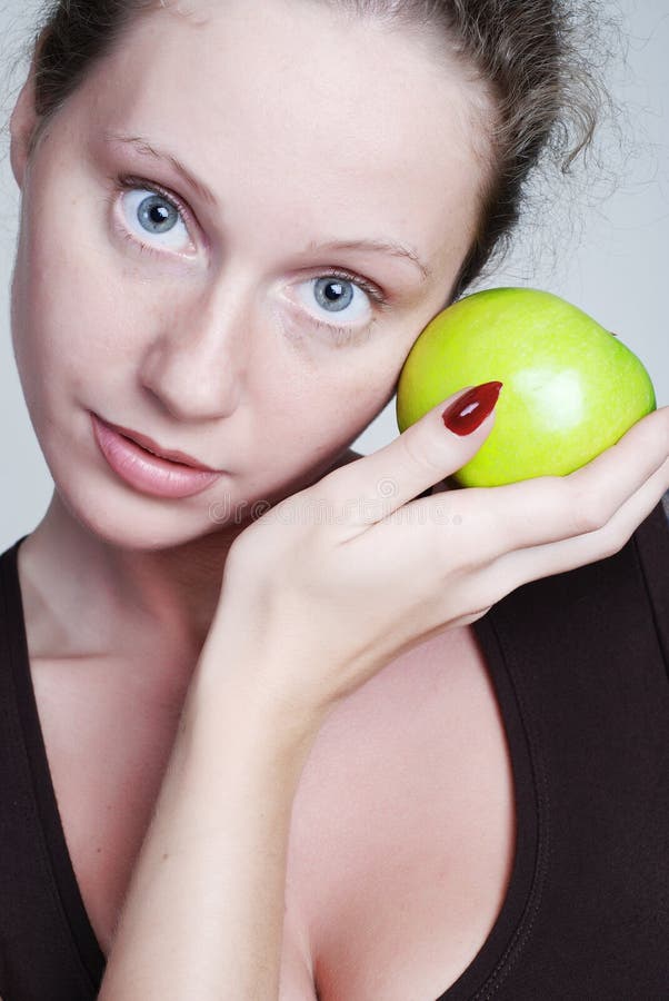 Woman and apple stock image. Image of neck, lips, close - 5350787