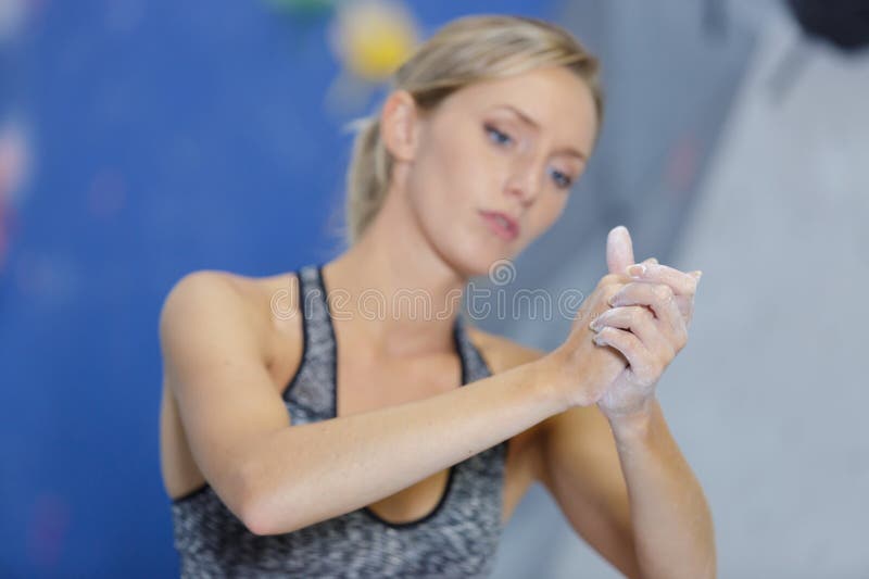 Woman Applying Chalk on Hands before Climbing Stock Photo - Image of ...