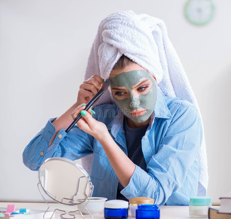 Woman Applying Clay Mask with Brush at Home Stock Image - Image of ...