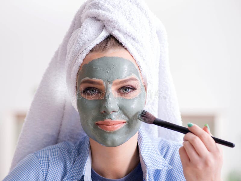 Woman Applying Clay Mask with Brush at Home Stock Image - Image of ...