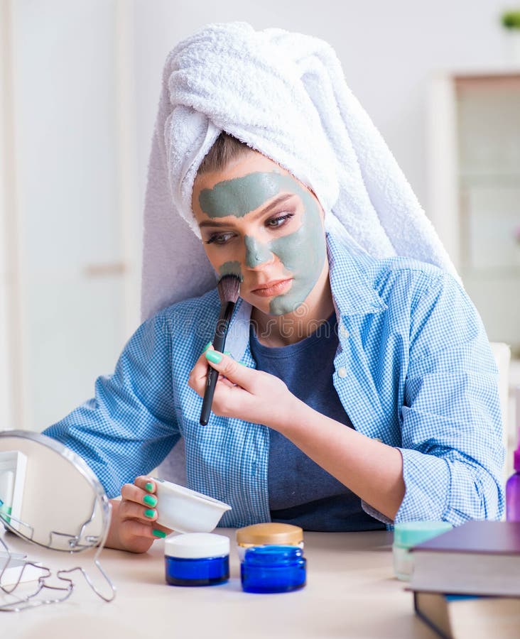 Woman Applying Clay Mask with Brush at Home Stock Photo - Image of ...