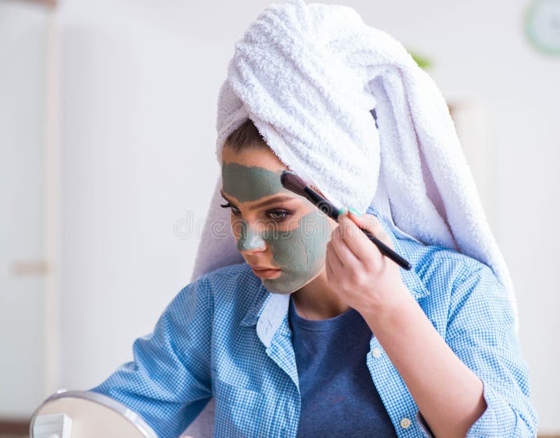 Woman Applying Clay Mask with Brush at Home Stock Image - Image of ...