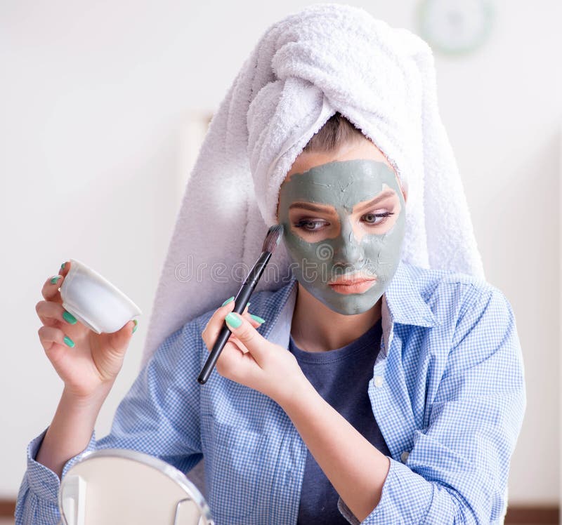 Woman Applying Clay Mask with Brush at Home Stock Image - Image of ...