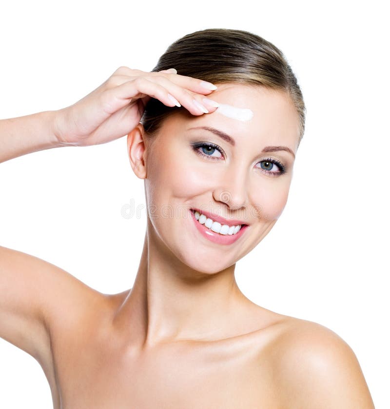 Woman Applying Cosmetic Cream Stock Image - Image of care, pampering ...