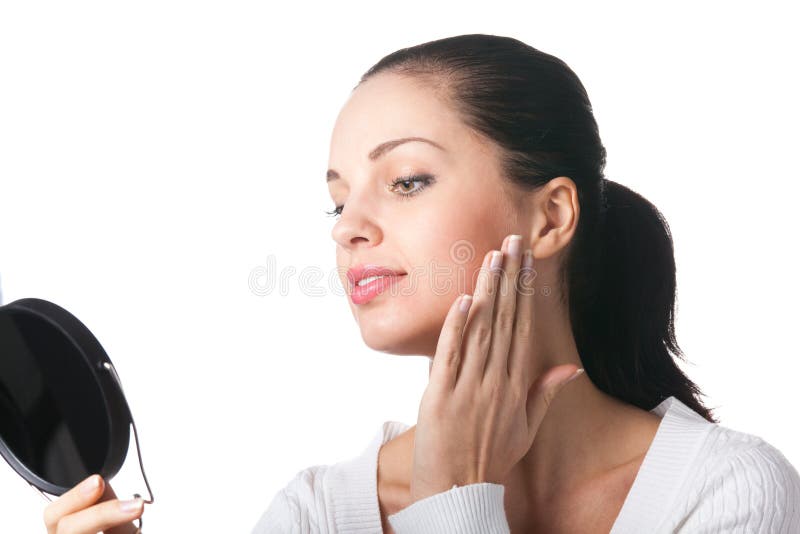 Woman applying makeup stock photo. Image of beautiful - 1684616